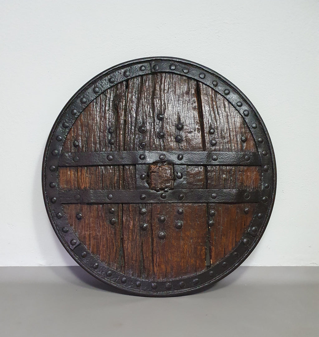 Antiq ox cart wheel 1800 – Logohuman